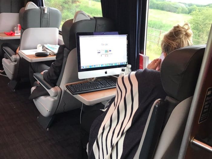 Commuter sets up desktop computer on train: Hot Clicks - Sports Illustrated