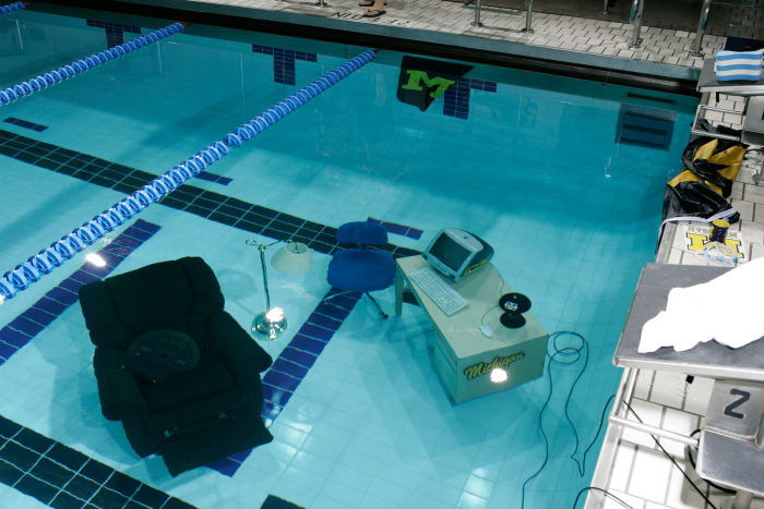 Michael Phelps poses at bottom of University of Michigan pool in 2005 ...