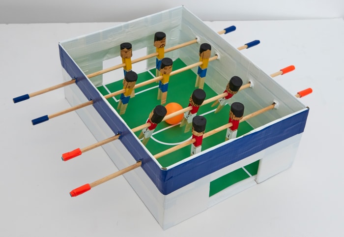 How to Make a Shoebox Foosball Game - Sports Illustrated
