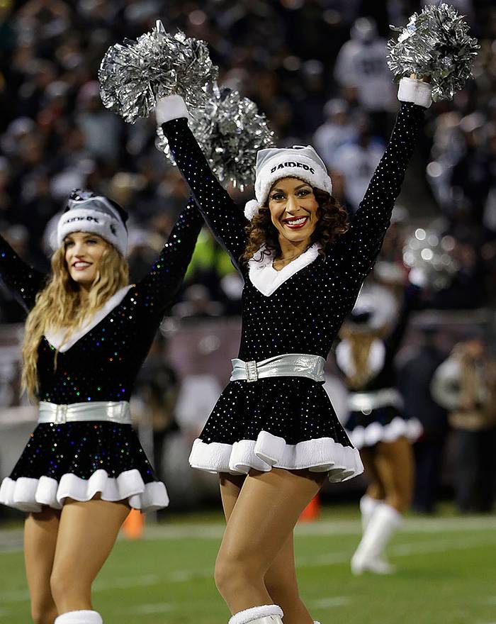 NFL Cheerleaders: Week 16 - Sports Illustrated