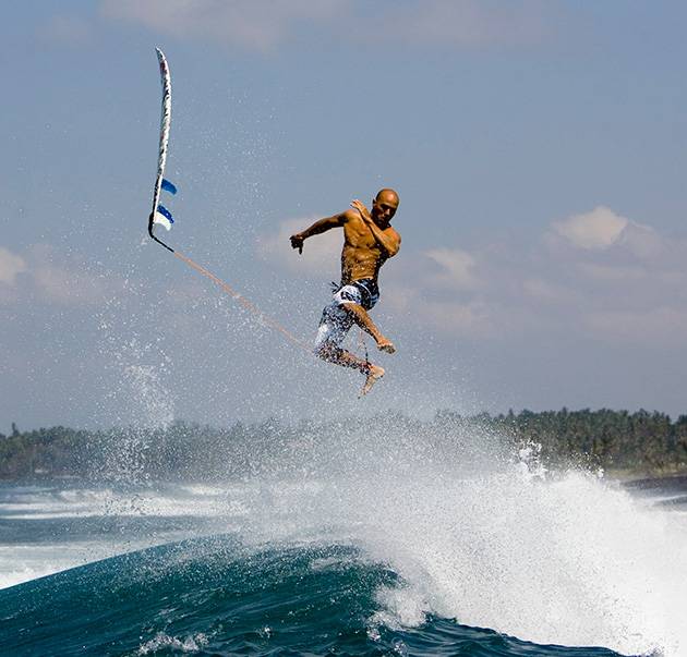 Why surfing legend Kelly Slater still takes to the waves - Sports ...