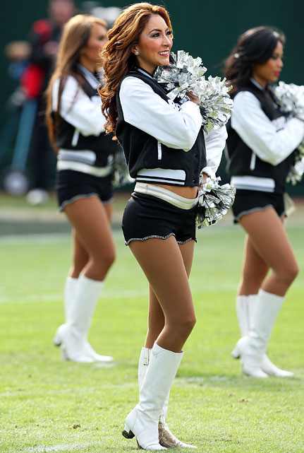NFL Cheerleaders: Week 16 - Sports Illustrated