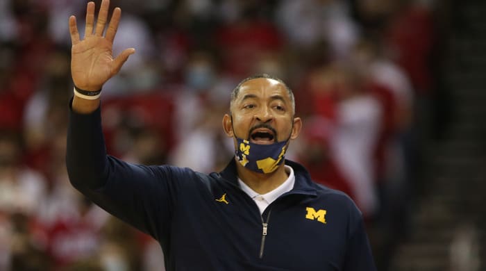 Michigan-Wisconsin fight: Juwan Howard suspended, Greg Gard fined ...