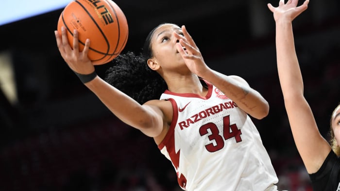 Razorbacks use size advantage, Samara Spencer's scoring to down ...