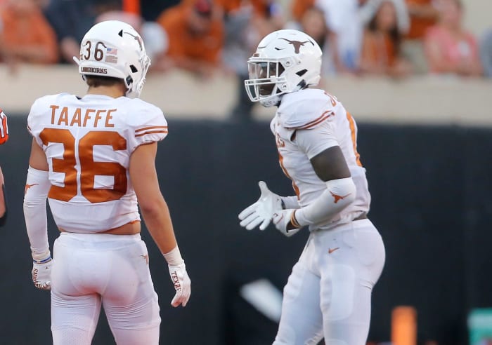 WATCH: Texas Longhorns Safety Michael Taaffe Makes Circus INT vs ...