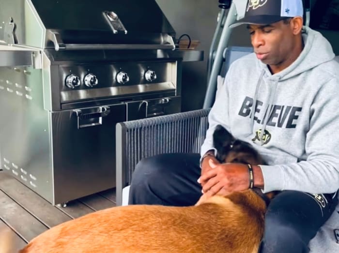 Deion Sanders at home with “man’s best friend” - Sports Illustrated ...