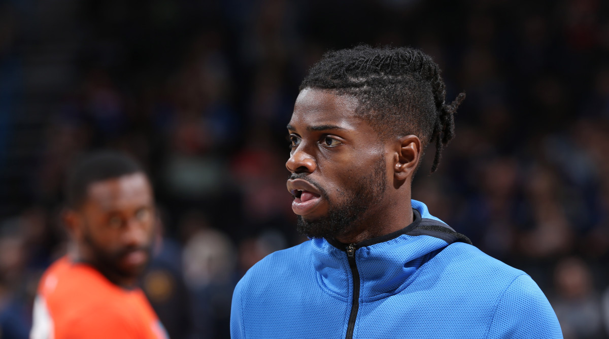 Nerlens Noel leaves game on stretcher after hitting head on court ...
