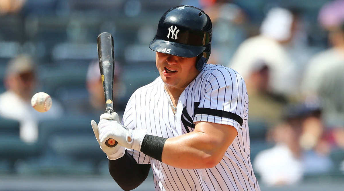 Yankees' Luke Voit hit by pitch in face vs Rockies, scores then exits ...