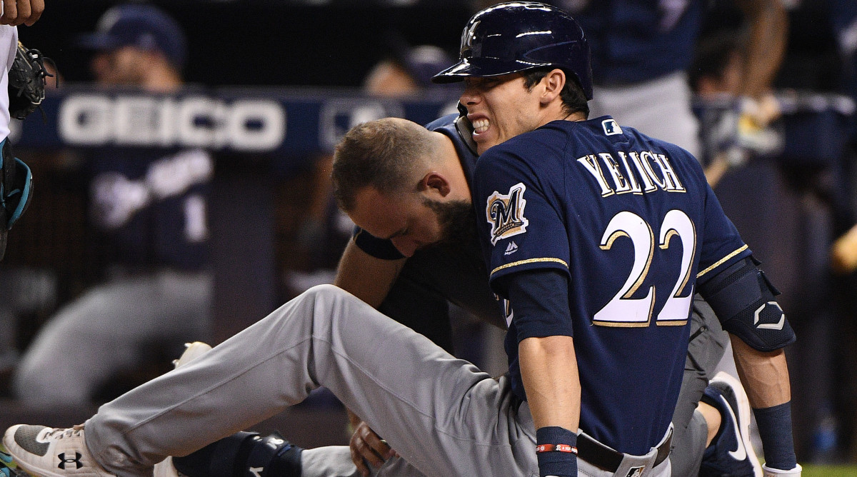 Christian Yelich won't require surgery on fractured kneecap - Sports ...