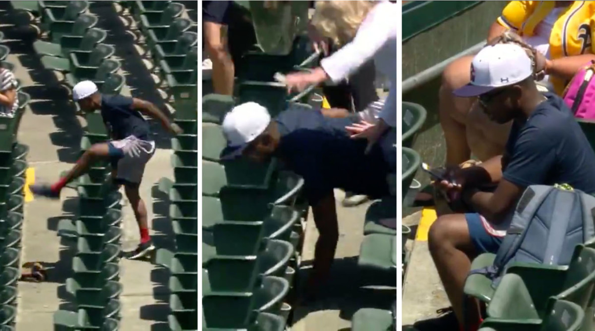 Fan falls over stands chasing ball during Angels vs A's (video ...