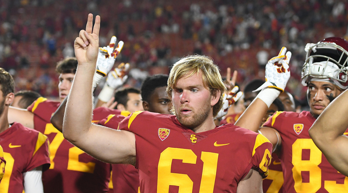 Jake Olson: Blind USC long snapper does 17 reps on bench press (video ...