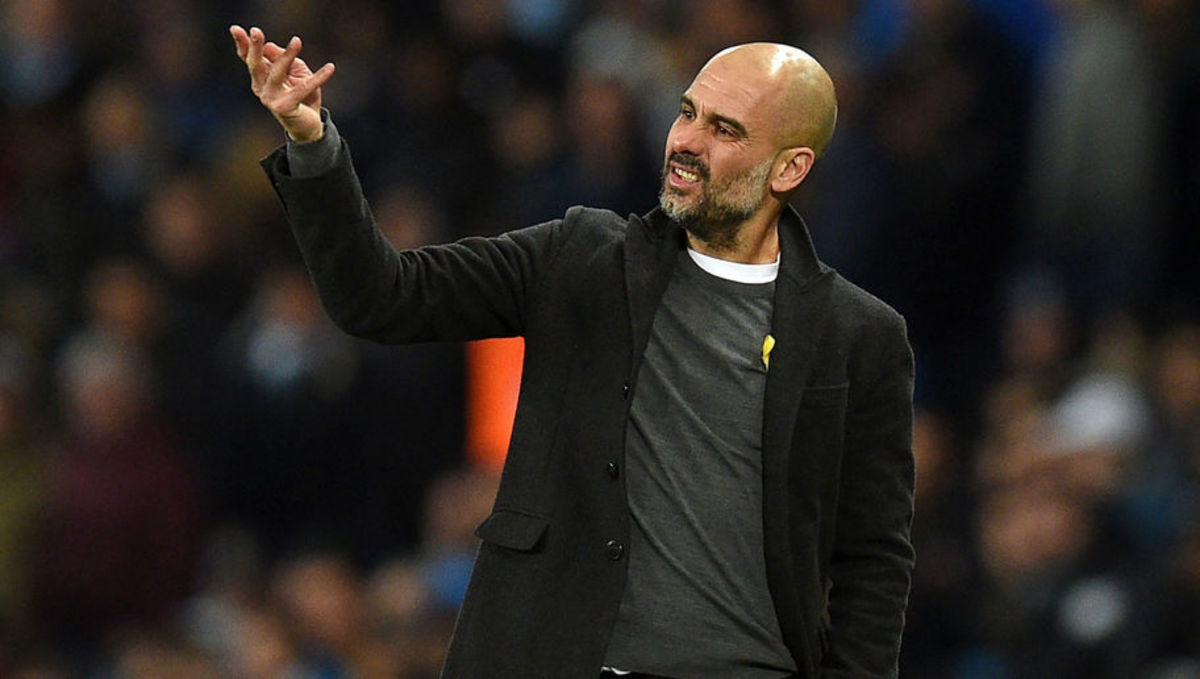 Pep Guardiola: Man City boss plays down early title celebrations ...