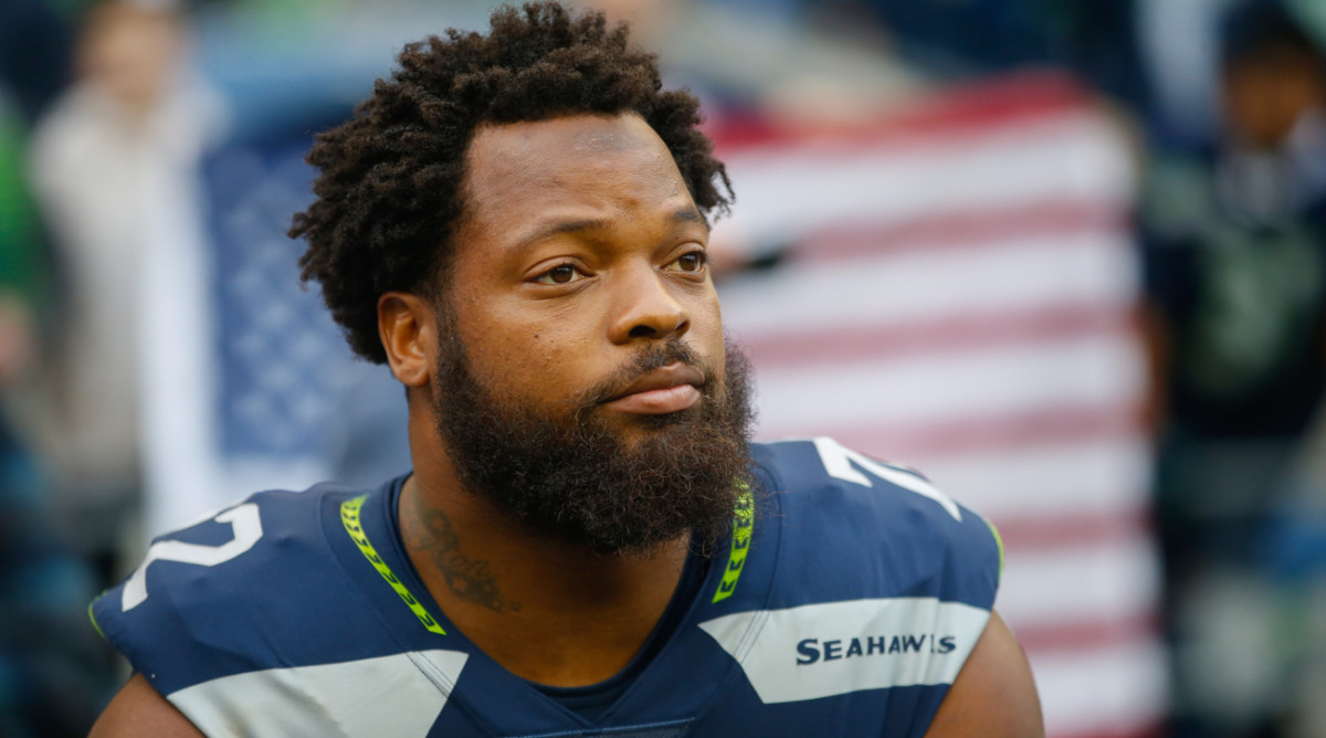 Michael Bennett turns himself into police on Monday - Sports Illustrated