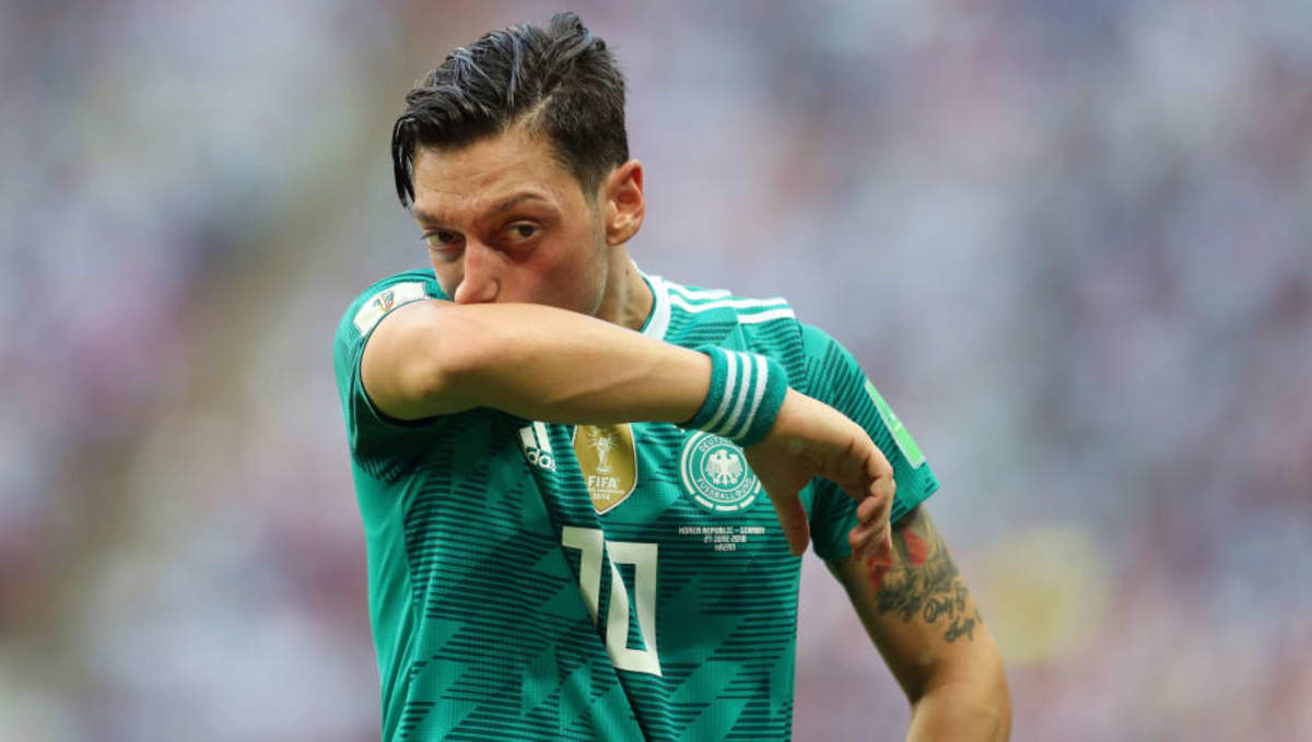 Mesut Ozil Involved in Verbal Dispute With Angry German Fans Following ...