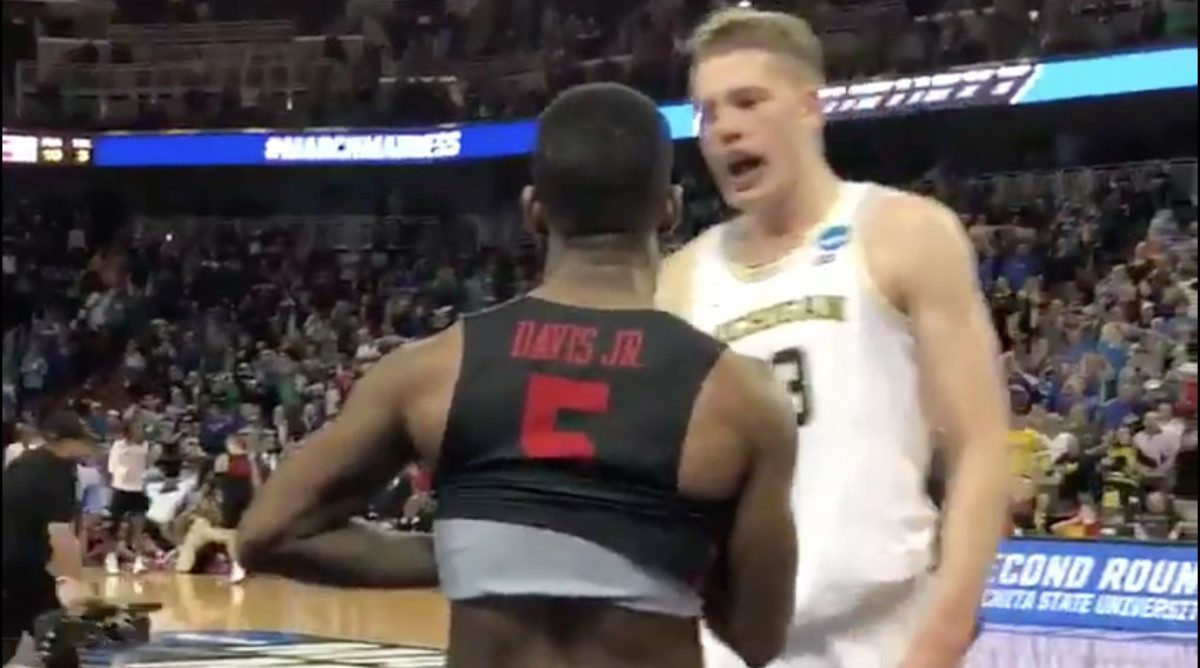 Mo Wagner: Michigan player hugs Houston player mid-celebration - Sports ...