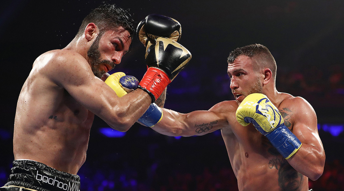 Lomachenko TKOs Linares in 10th to wins lightweight title - Sports ...