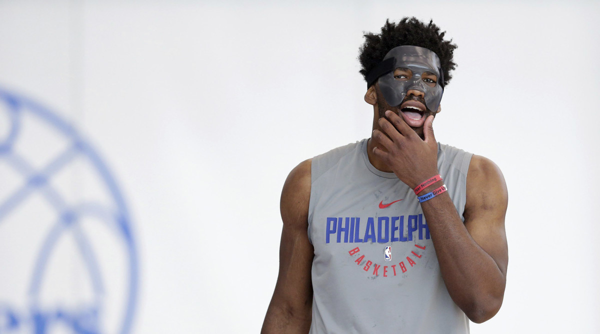 Watch: Justise Winslow steps on Joel Embiid's face mask - Sports ...