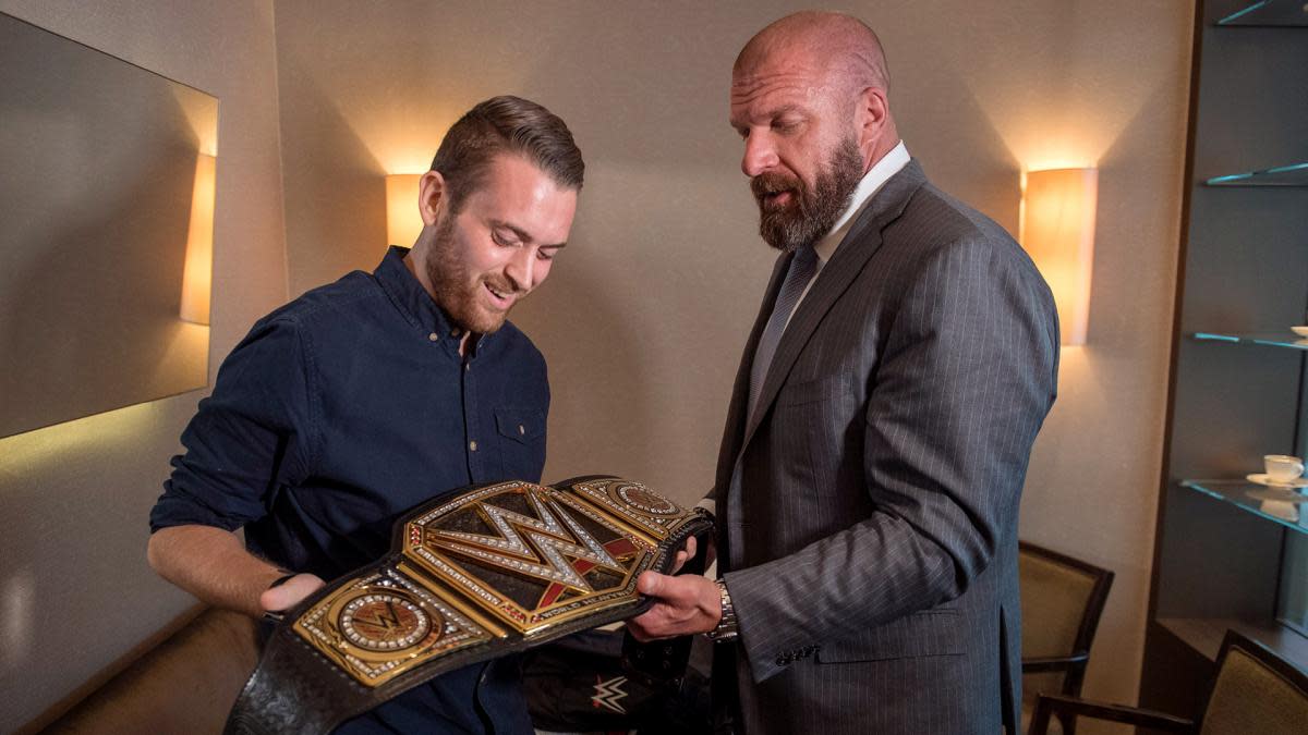 WWE's Triple H surprises London police officer with belt - Sports ...