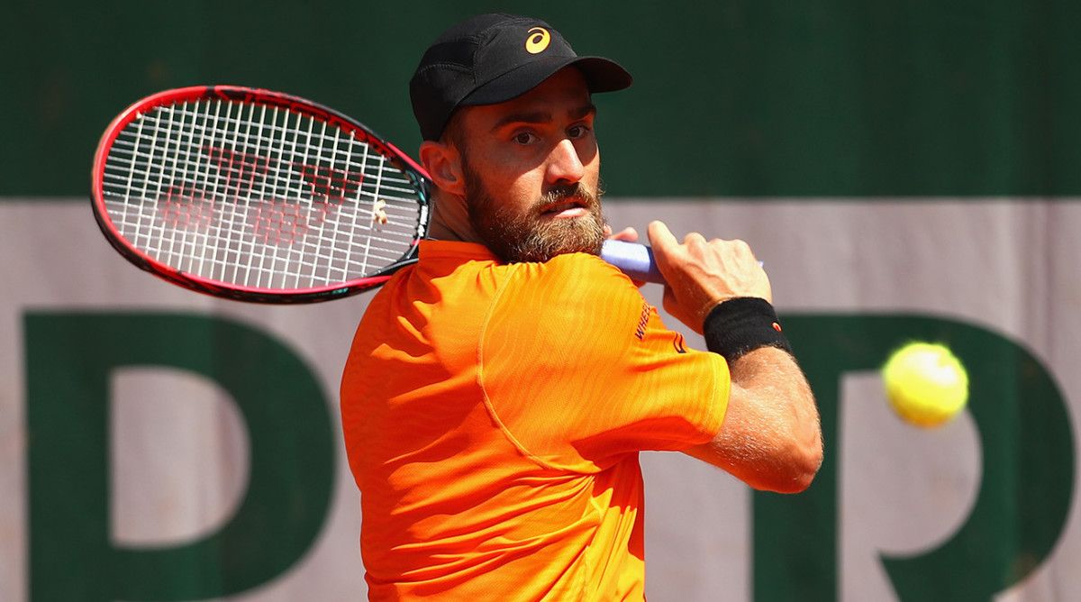 French Open: Steve Johnson sobs after win, father death - Sports ...