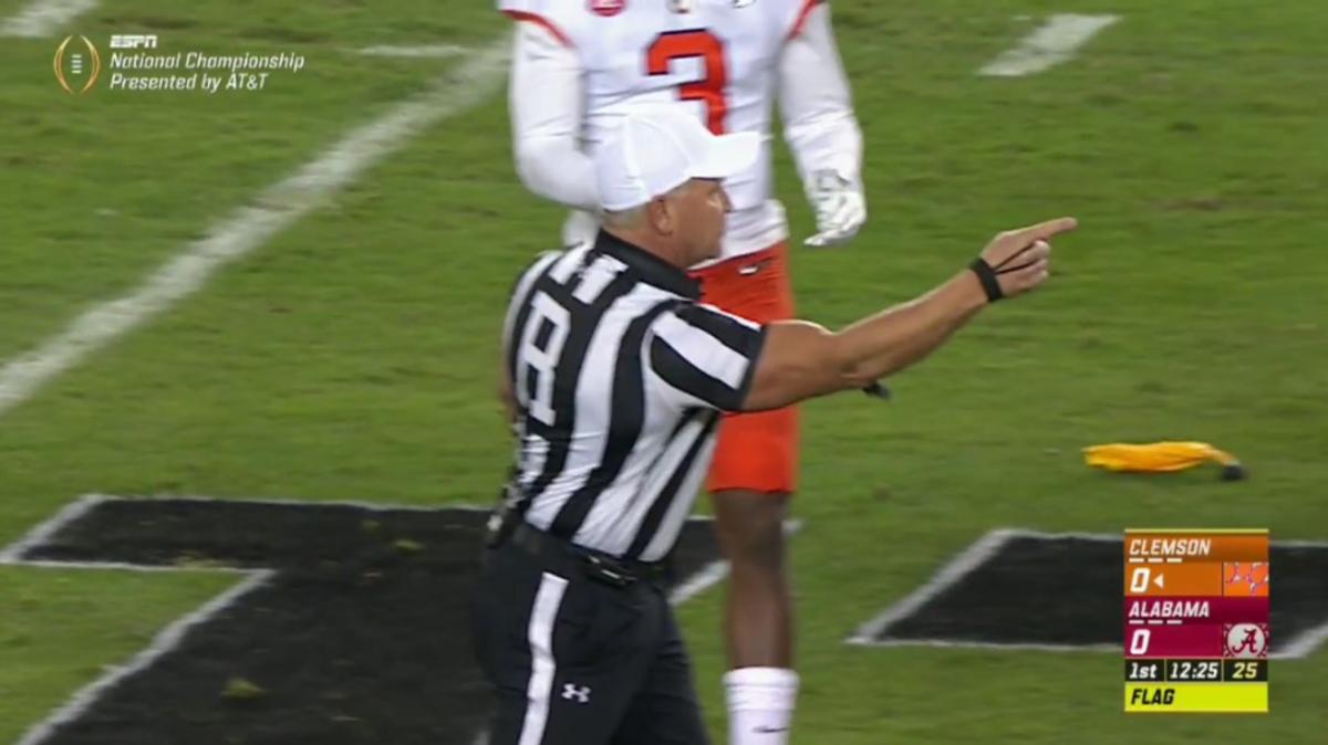 Who is the referee in the national championship game? Mike Defee ...
