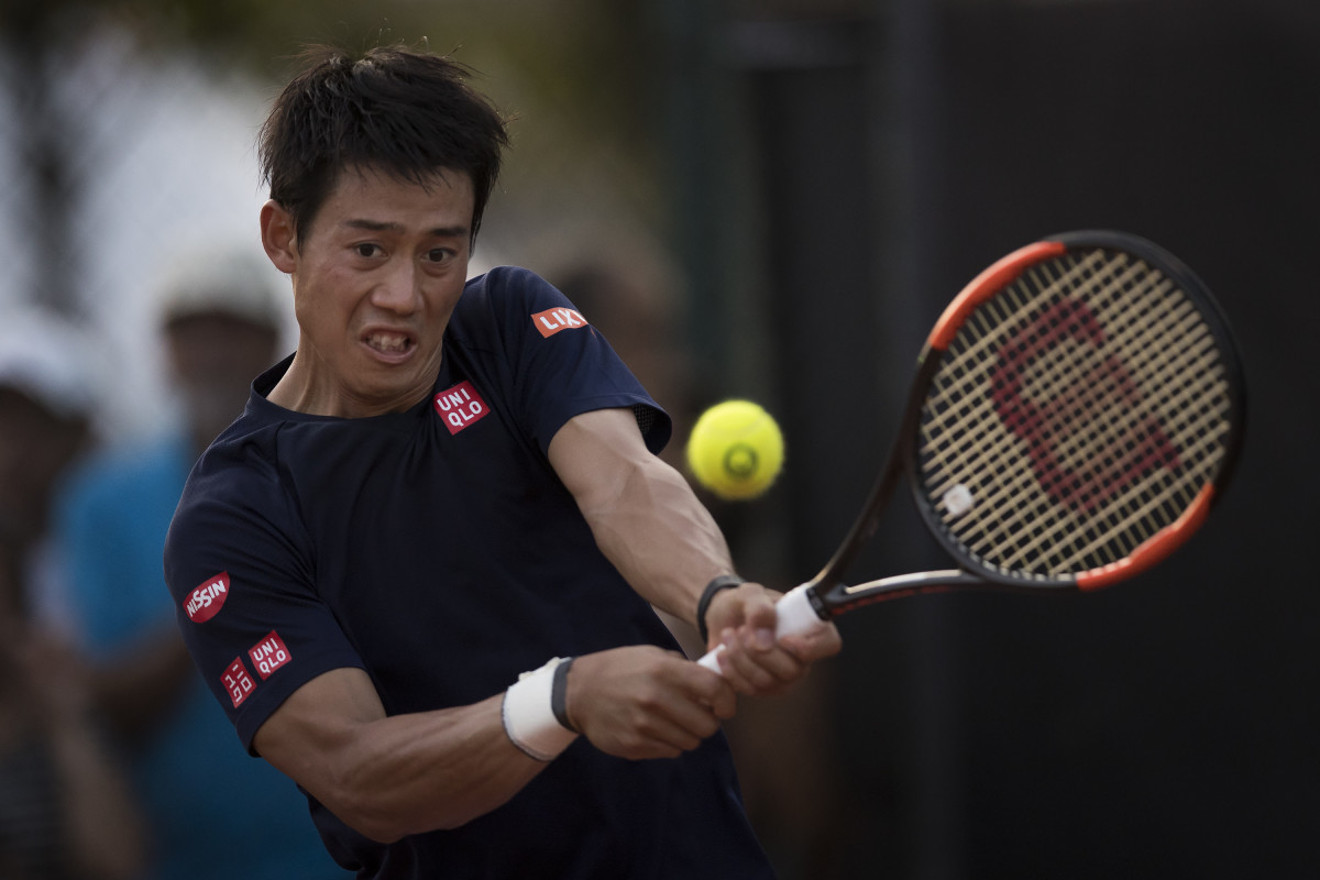 Top-seeded Nishikori upset by Bellucci in first round in Rio - Sports ...