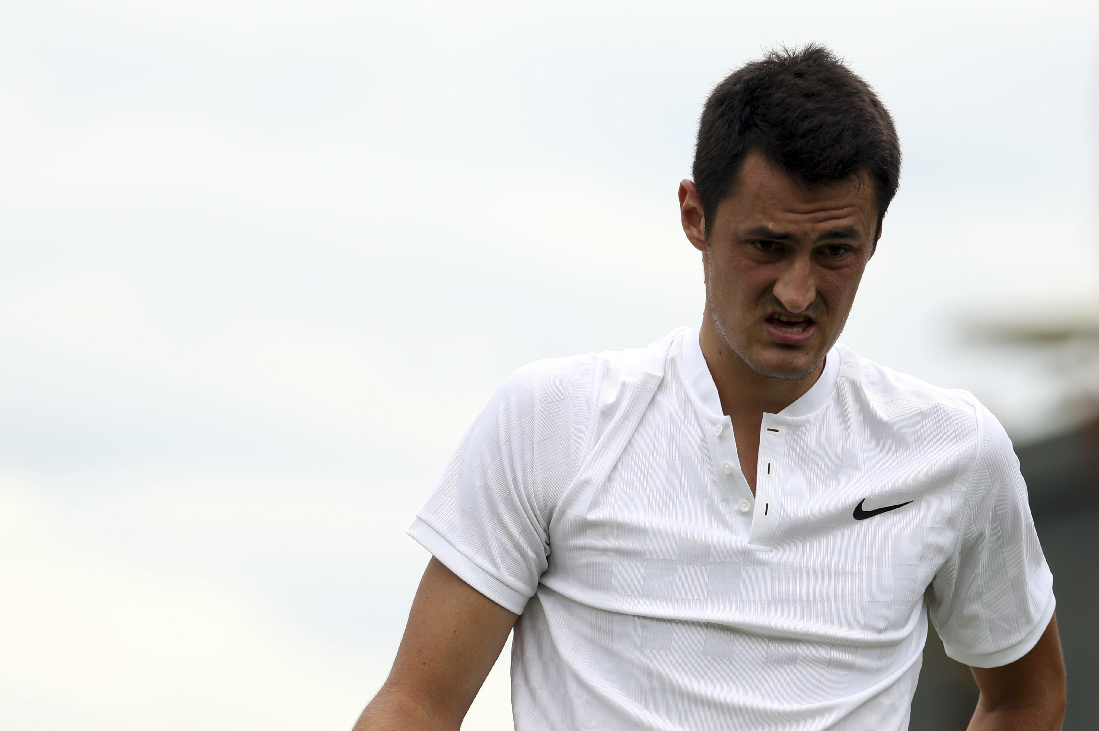 Tomic's Wimbledon words draw $15K fine, racket sponsor loss - Sports ...
