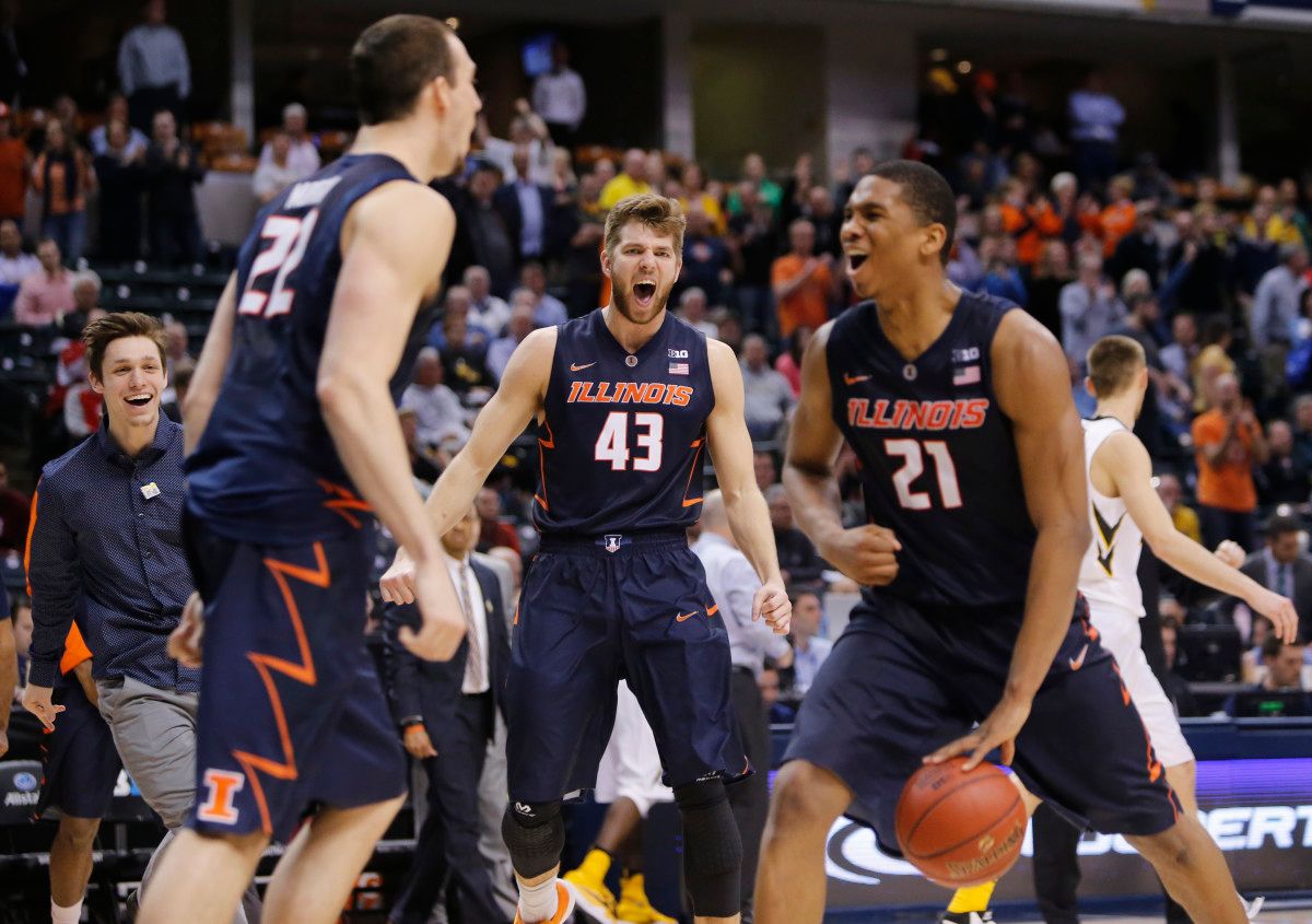 Illinois holds on for stunning 68-66 upset of No. 20 Iowa - Sports ...