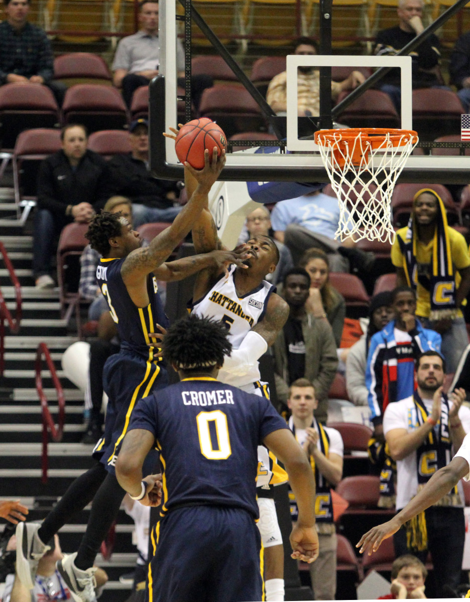 Chattanooga holds off ETSU 73-67 to win SoCon championship - Sports ...