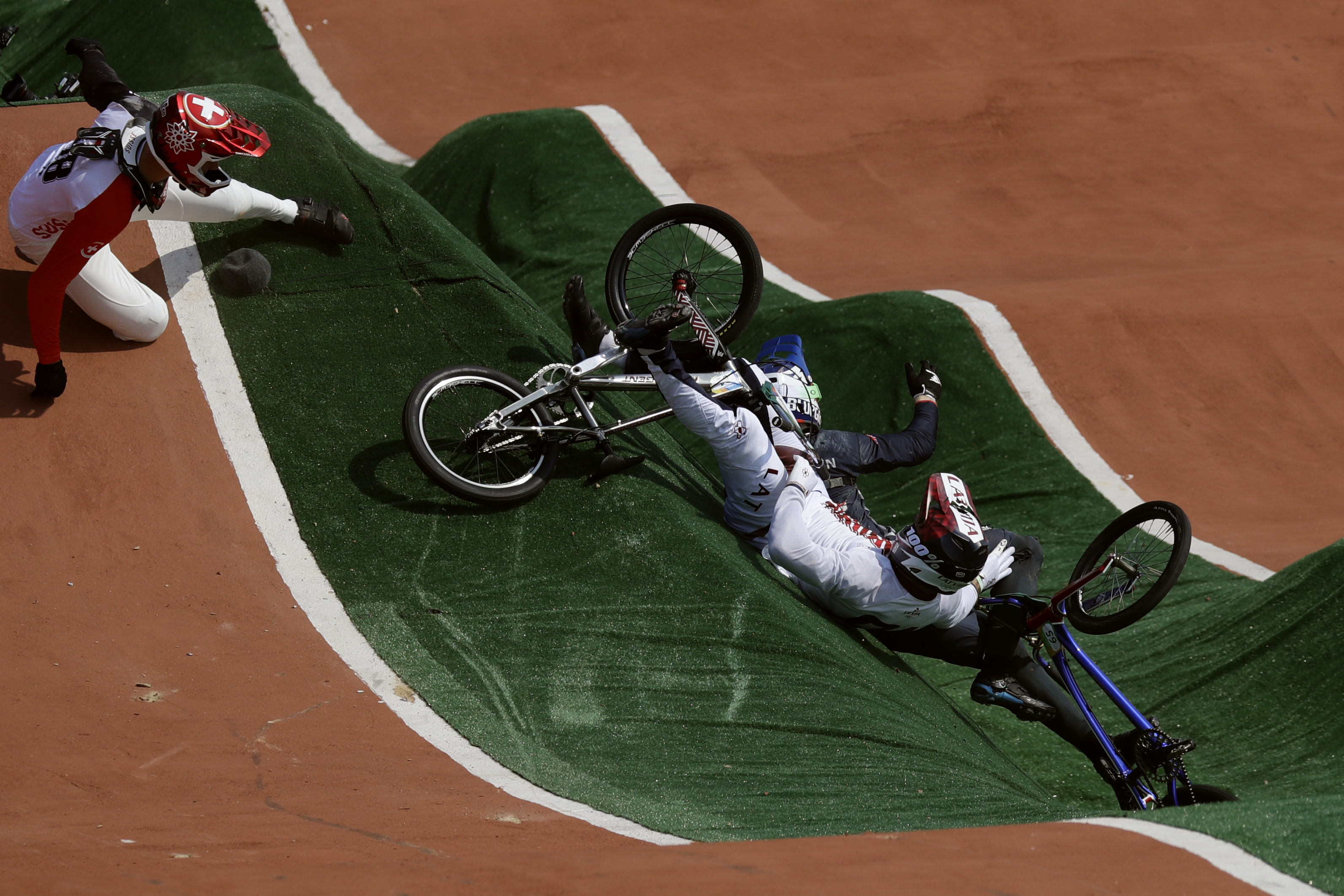 US riders advance, but defending champ Strombergs out at BMX - Sports ...