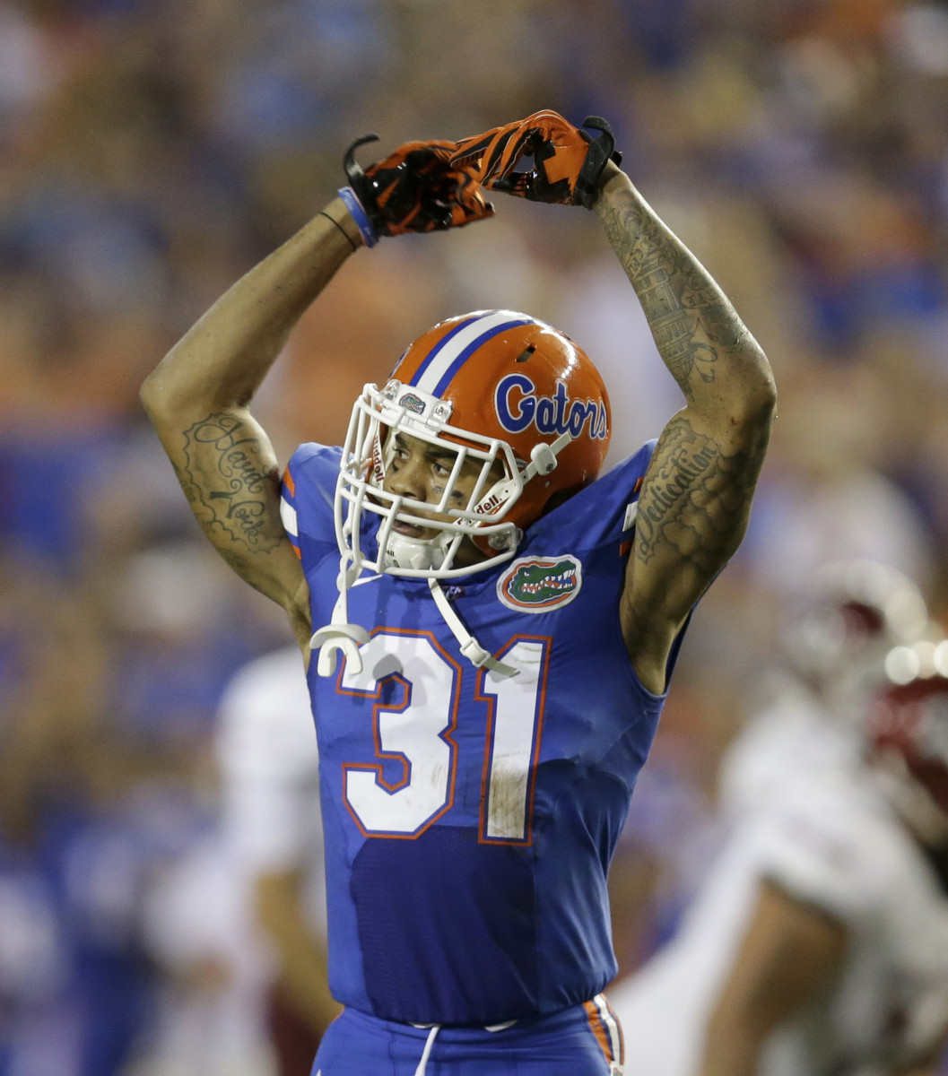 AP source: Florida suspends Tabor, Lewis for practice fight - Sports ...