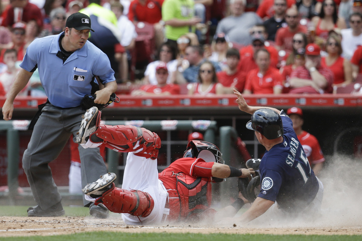 Martin, Cano help Mariners sweep, hand Reds 7th loss in row - Sports ...
