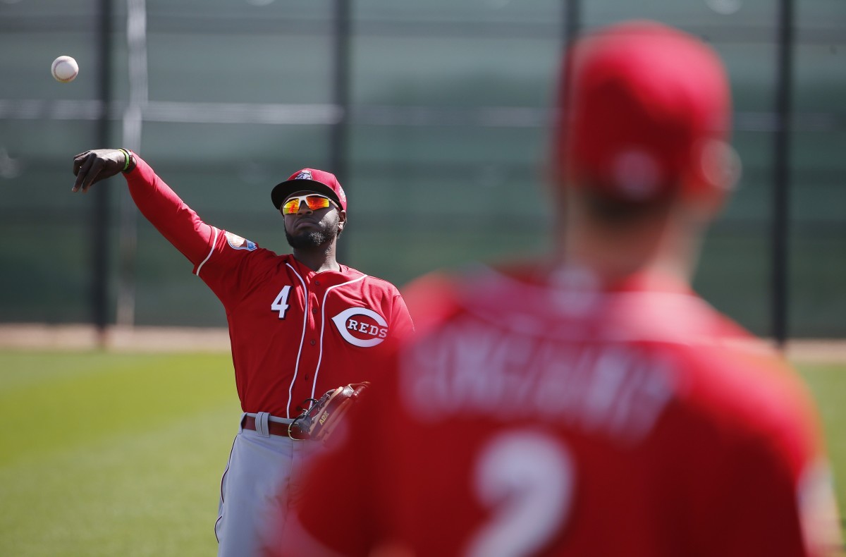 Despite offseason deals, Reds' Phillips back for 11th year - Sports ...