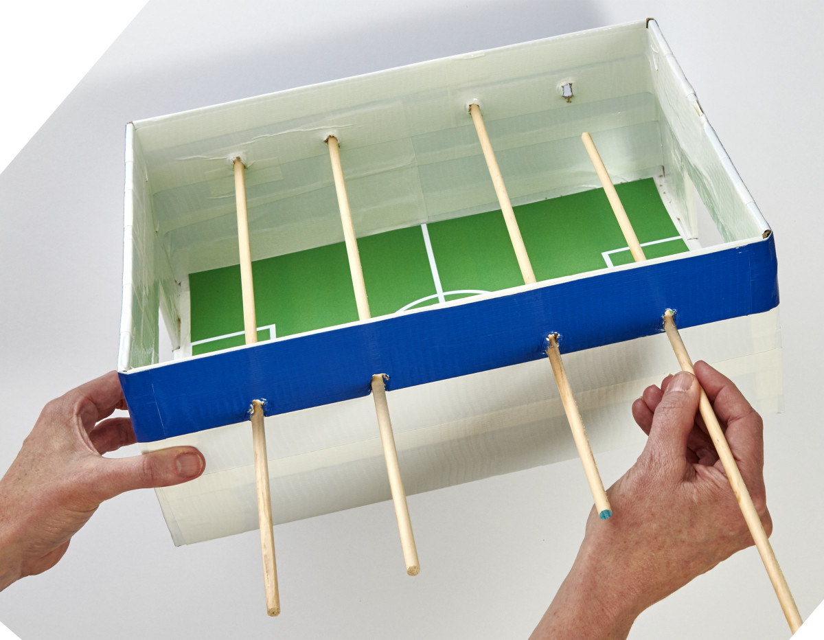 How to Make a Shoebox Foosball Game - Sports Illustrated