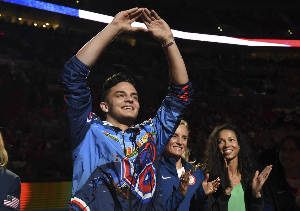 Olympian Devon Allen says he's going pro in track - Sports Illustrated