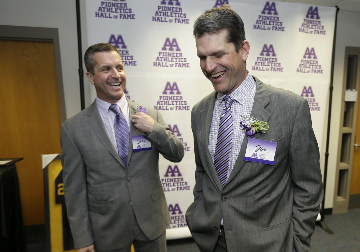 The Harbaugh brothers enjoy a day and an honor back home - Sports ...