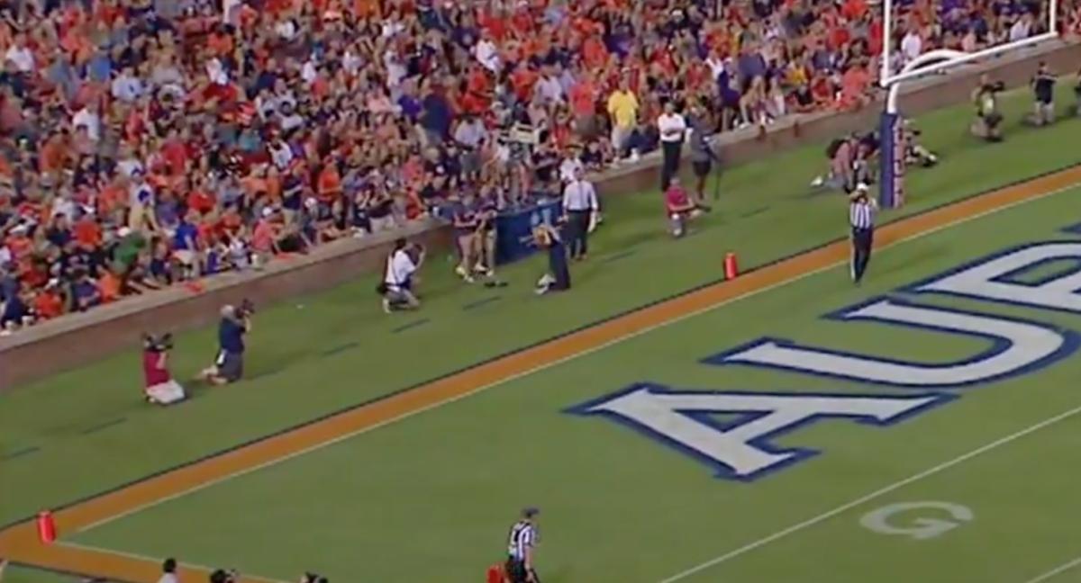 Photographer gets hit in the face by football at LSU game - Sports ...