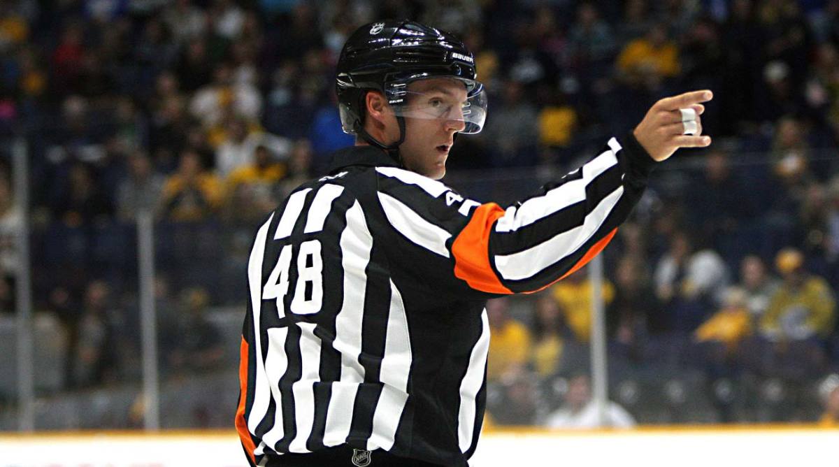 Golfer Garrett Rank becomes full-time NHL referee - Sports Illustrated