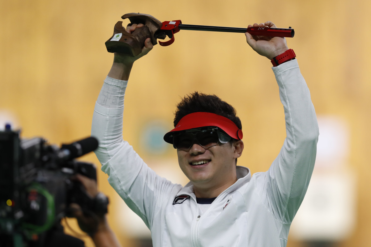 Jongoh wins third 50-meter pistol gold after miscue - Sports Illustrated