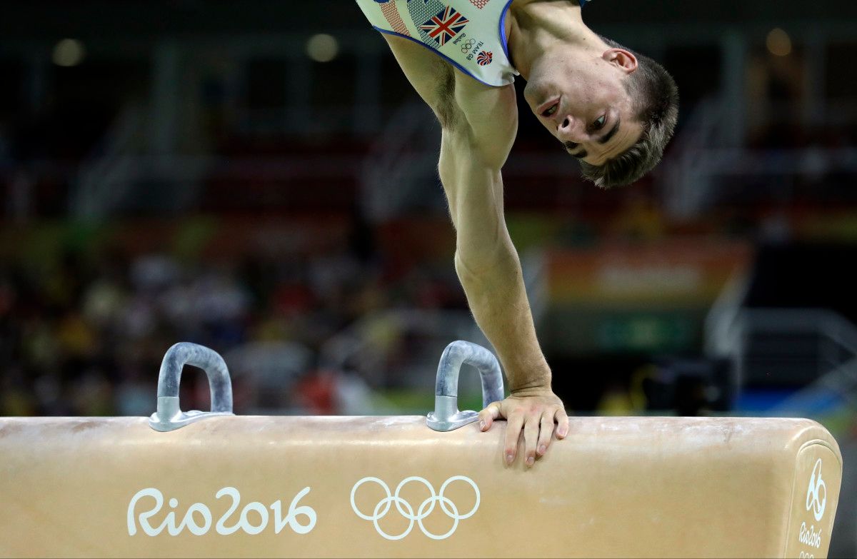 Max Whitlock gives Britain 1st gold medals in gymnastics - Sports ...