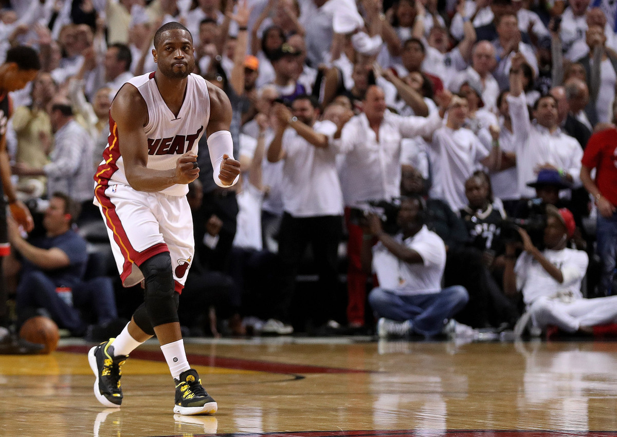 Wade gets 30, Heat rally and beat Raptors 94-87 in OT - Sports Illustrated