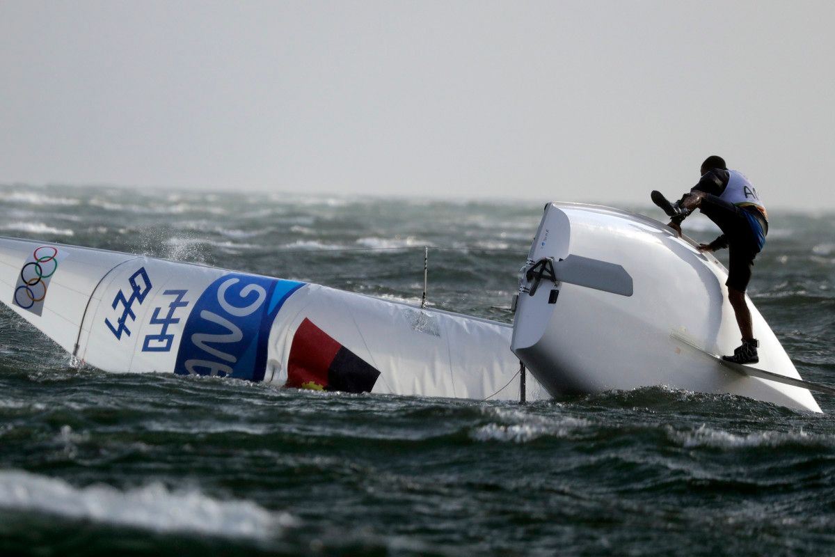 Foul weather hits Olympics, on the track and at sailing - Sports ...