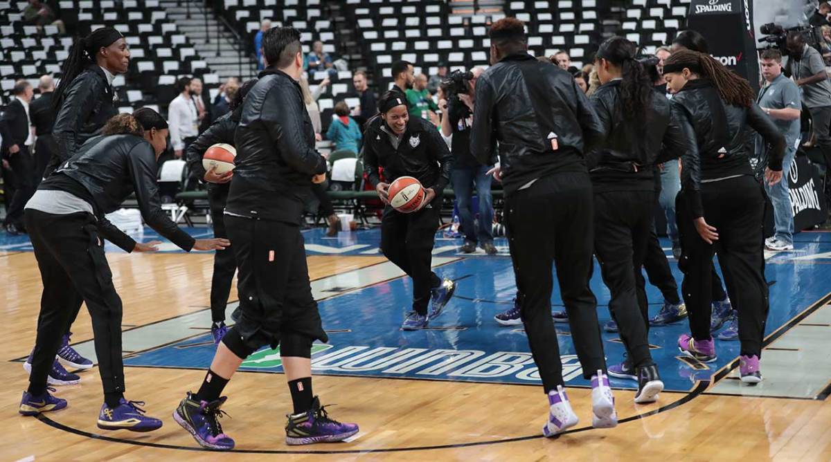 WNBA players wear warmups to honor shooting victims - Sports Illustrated