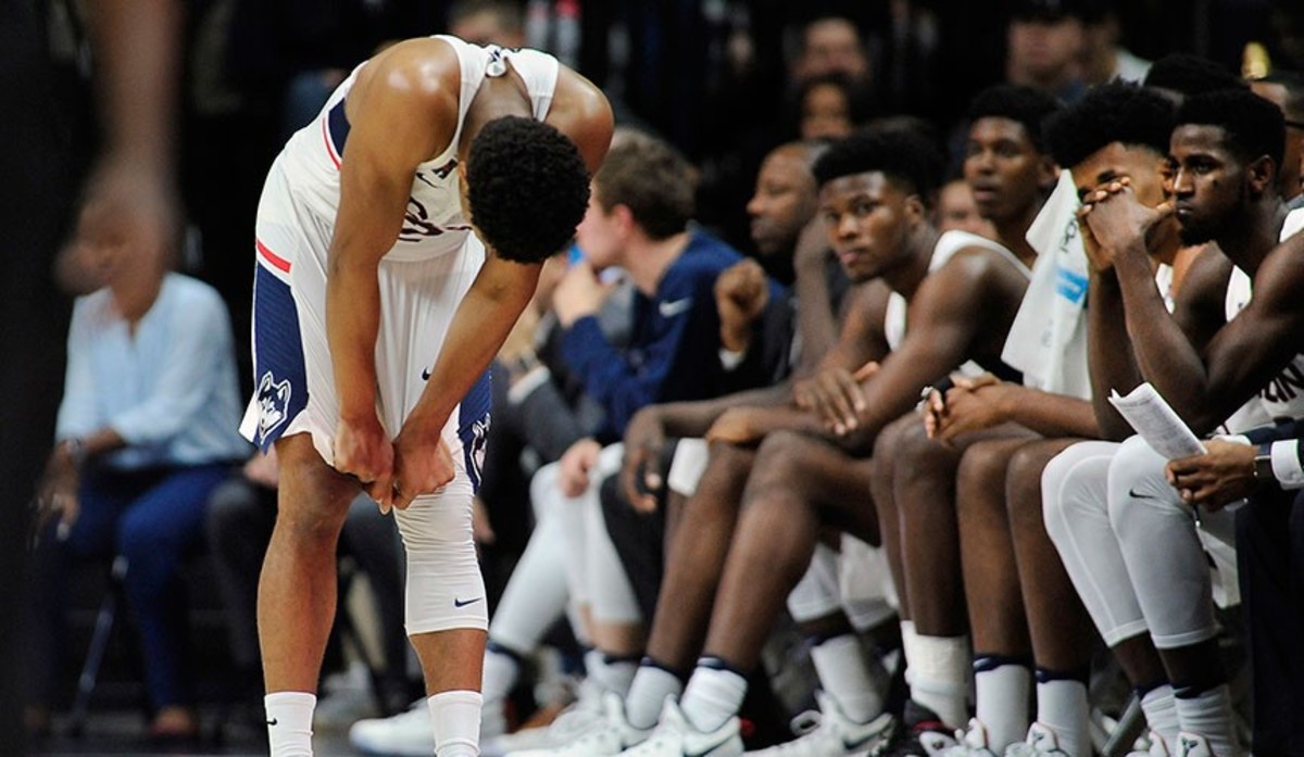 Evaluating team, player performances from college basketball opening ...