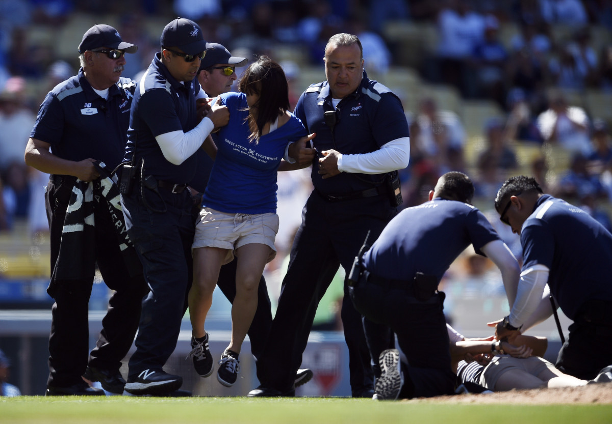 Animal rights protesters delay Dodgers-Rockies game - Sports Illustrated