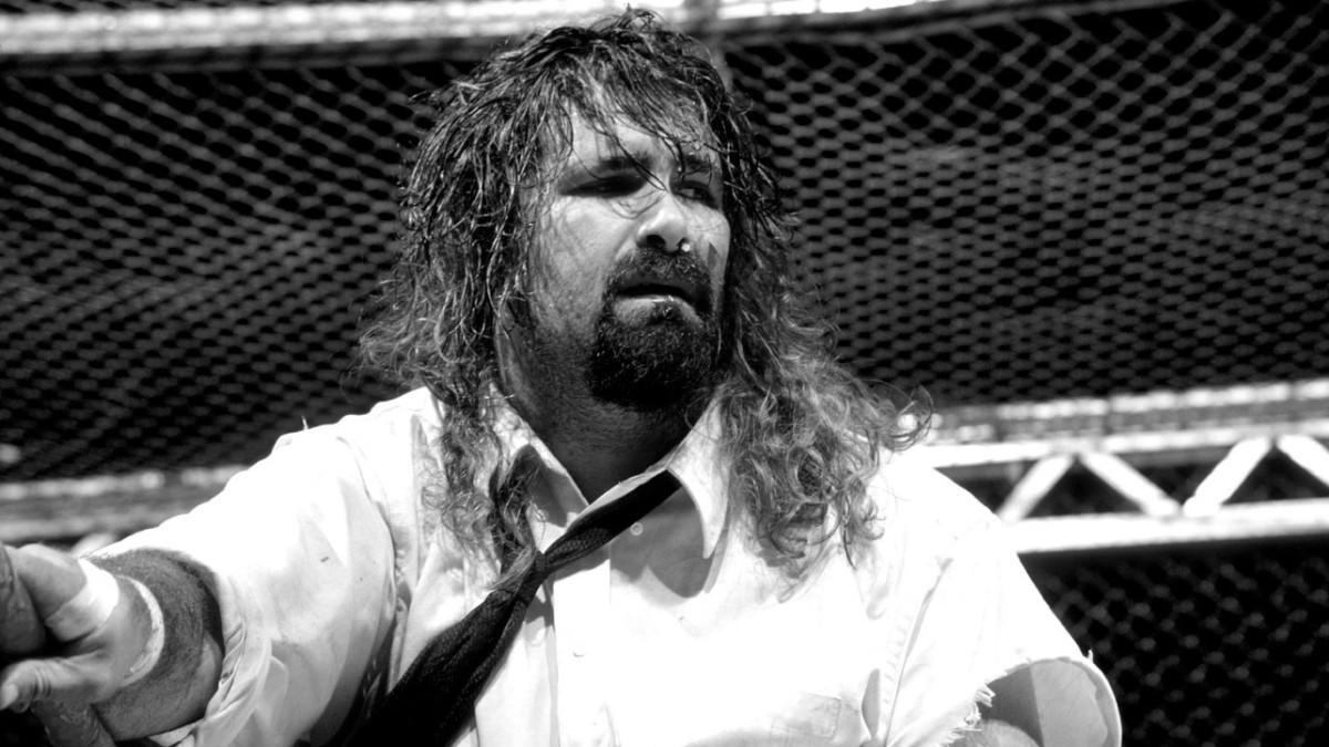 WWE Raw: Mick Foley loses HIAC tooth (video) - Sports Illustrated