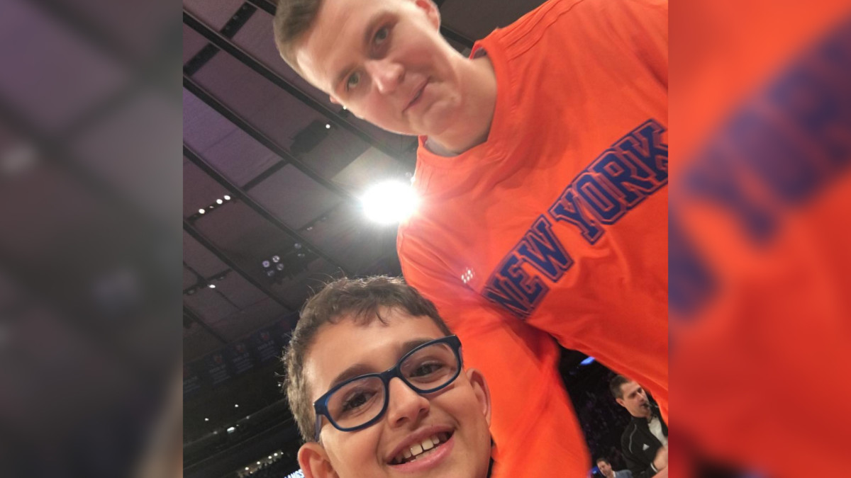 Crying Knicks fan from NBA Draft meets Kristaps Porzingis and family ...