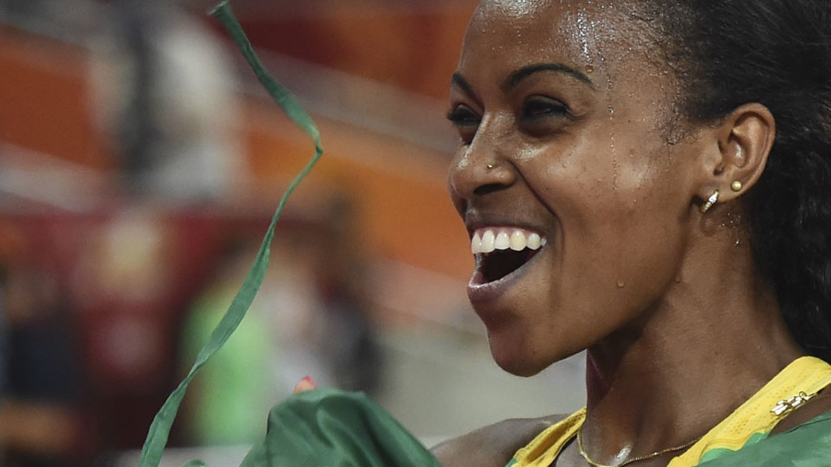 Genzebe Dibaba breaks indoor mile world record - Sports Illustrated