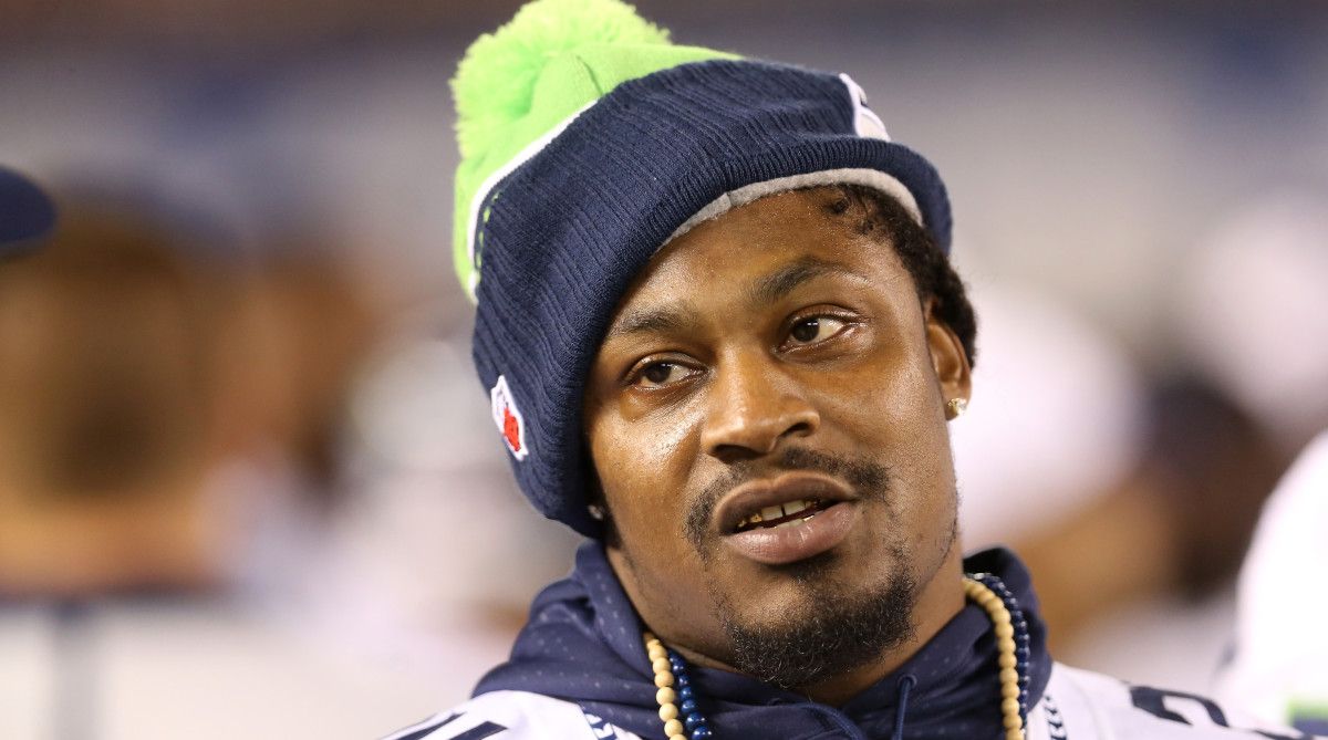 Marshawn Lynch returns to Seahawks in Seattle gear - Sports Illustrated