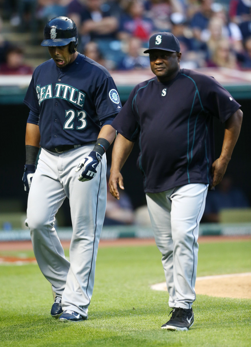 Cruz out of Mariners' starting lineup because of back spasms - Sports ...