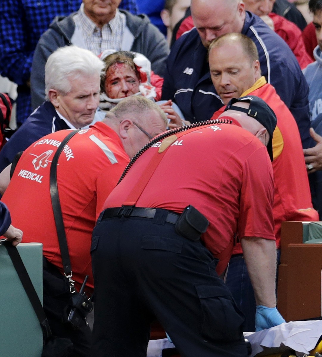Police: Life-threatening injury to fan hit by bat at Fenway - Sports ...